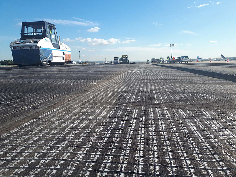 Geotextile asphalt reinforcement for road rehabilitation